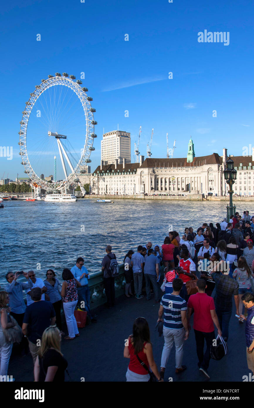 The London Eye giant Ferris wheel on the South Bank of the River Thames ...