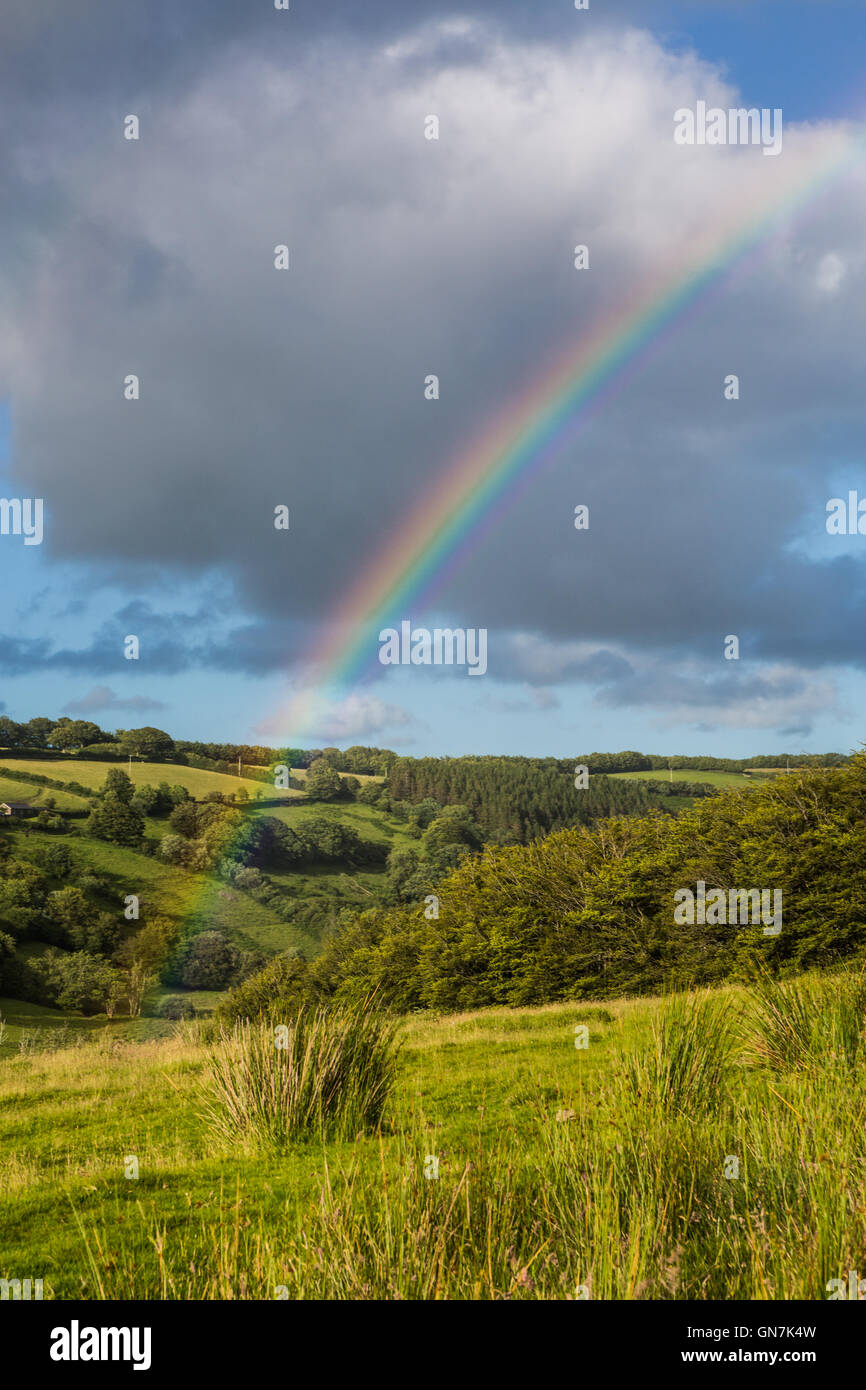 Rainbow over Withypool Common, near Landacre Bridge, Exmoor, UK Stock ...