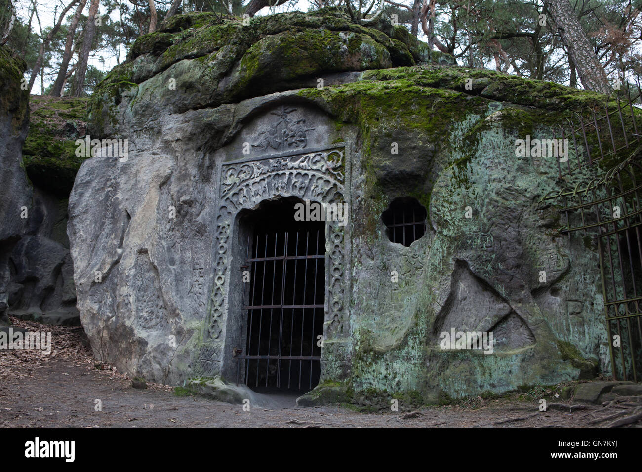 Entrance to the Klacelka Cave flanked with two giants with clubs carved ...