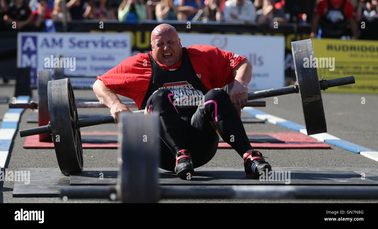 Robert Kalinowski of Poland falls during the Ultimate Strongman Masters ...