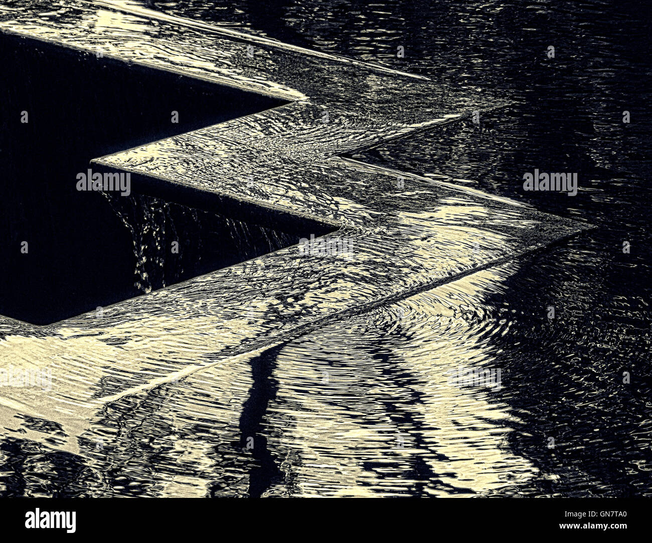 water reflection off modern water design Stock Photo - Alamy