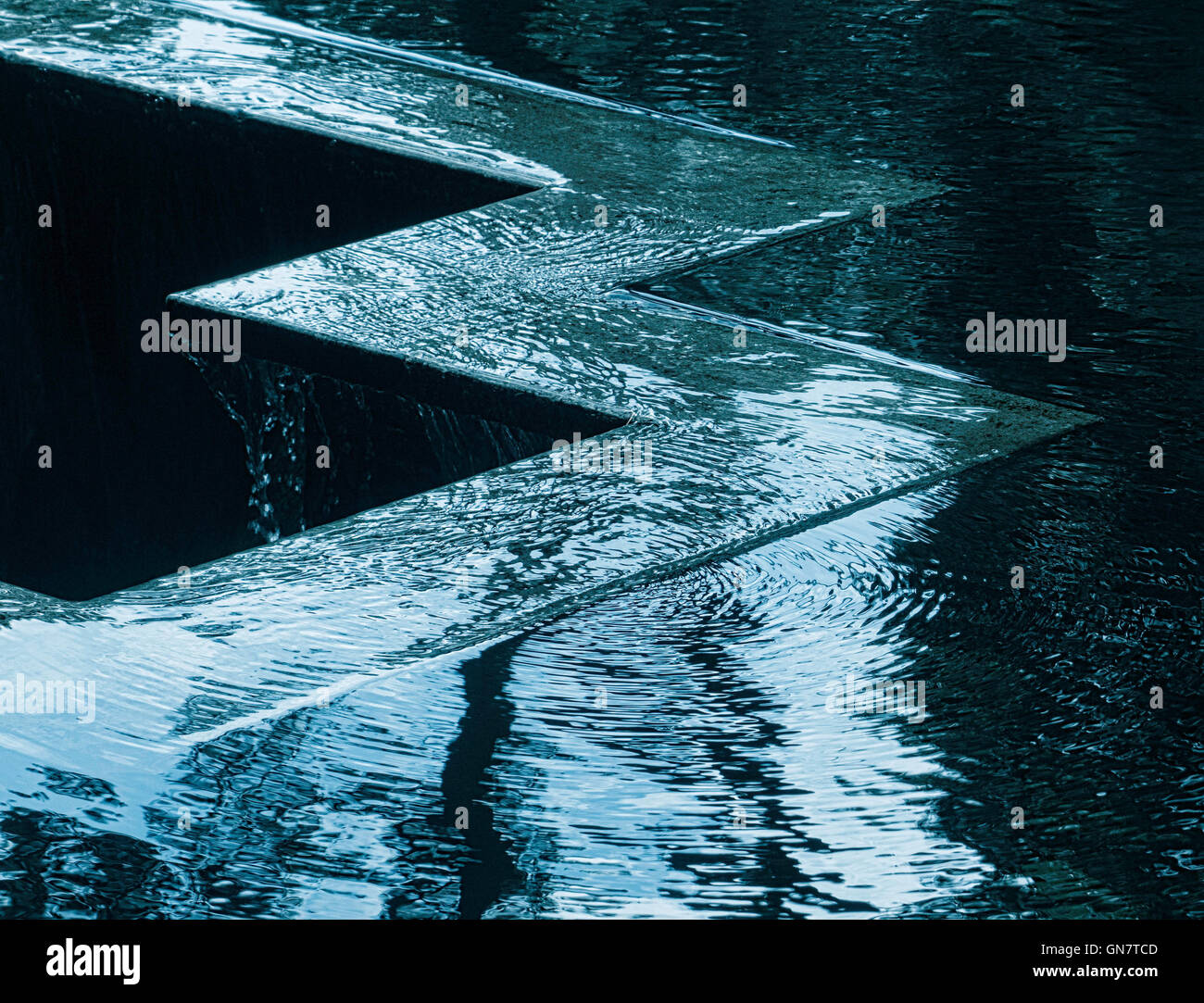 water reflection off modern fountain Stock Photo - Alamy