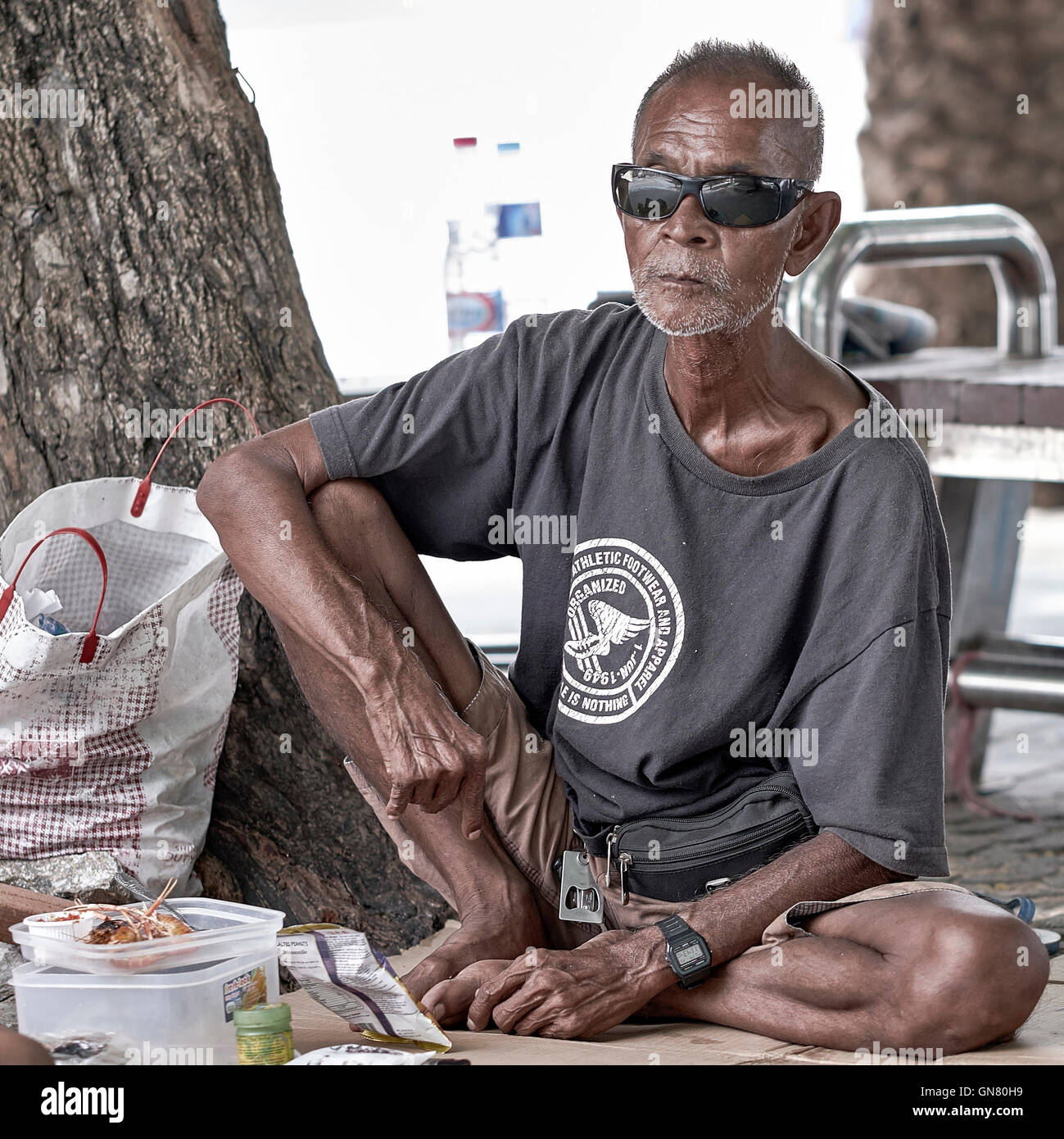 Homeless man. Elderly man. Homeless person, Pattaya Thailand S. E. Asia ...