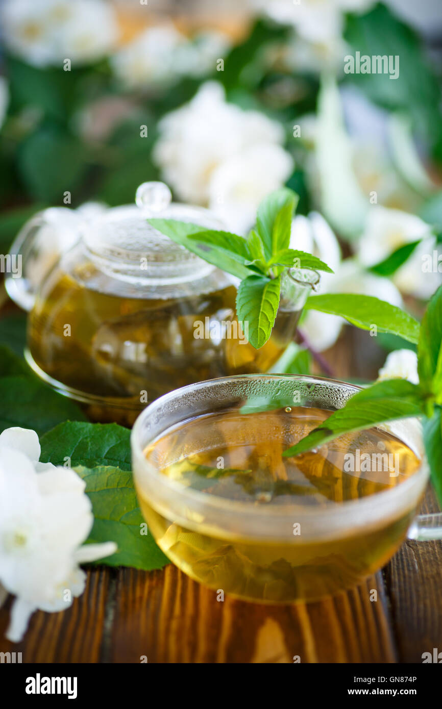 Jasmine tea in a glass pot Stock Photo - Alamy