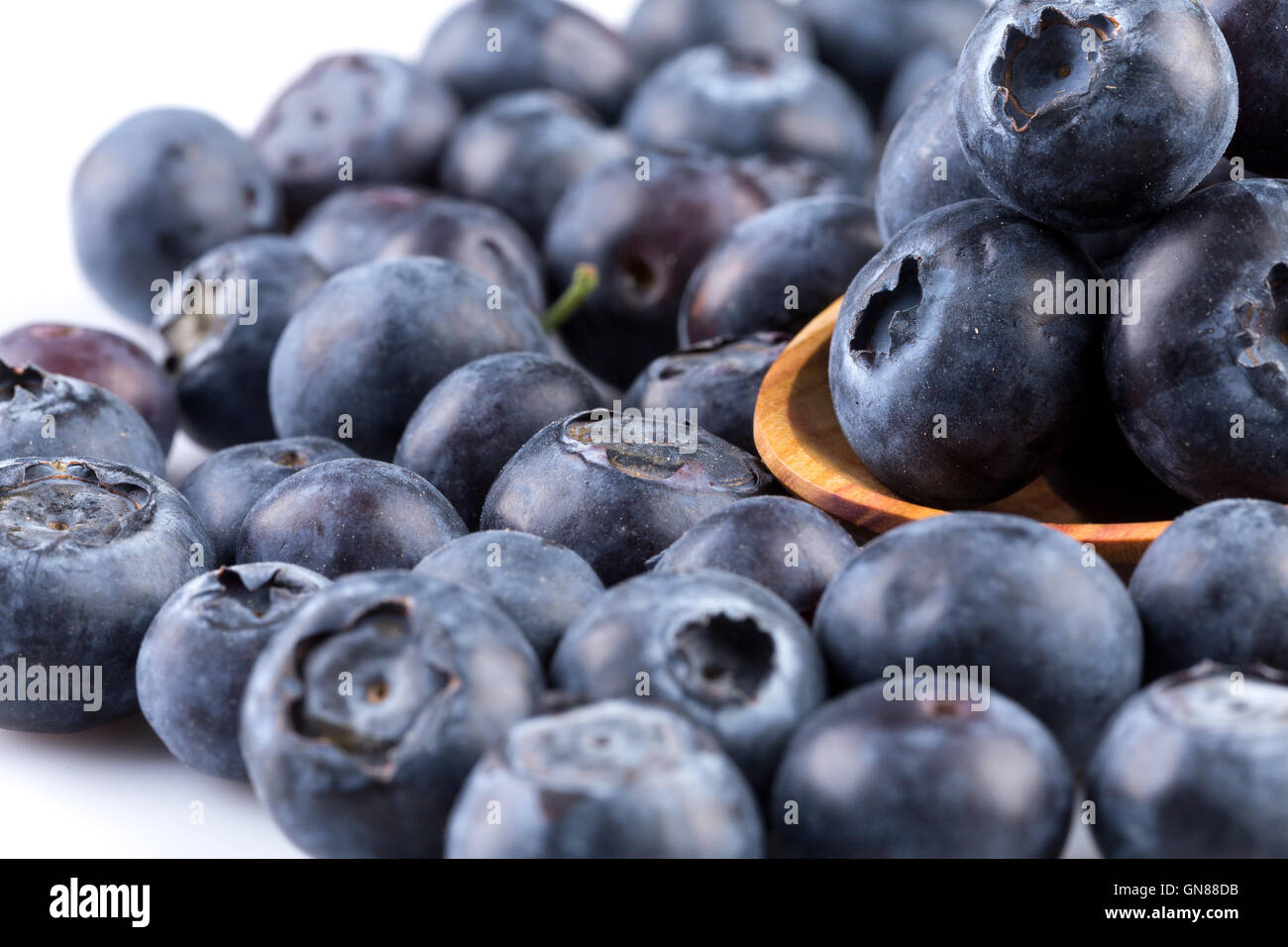 Fresh juicy blueberries isolated on white background Stock Photo - Alamy