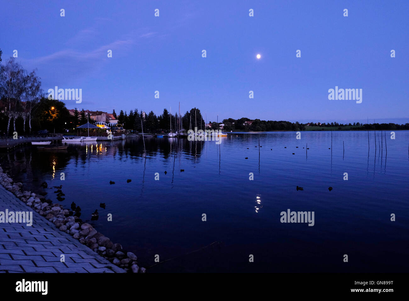 View of lake Ryn in the town of Ryn located between Lake Ryn and Lake ...