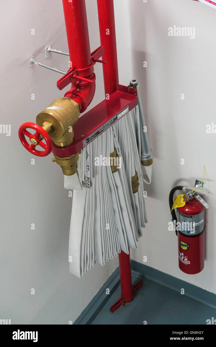 Standpipe Firefighting Equipment in Stairwell Stock Photo - Alamy