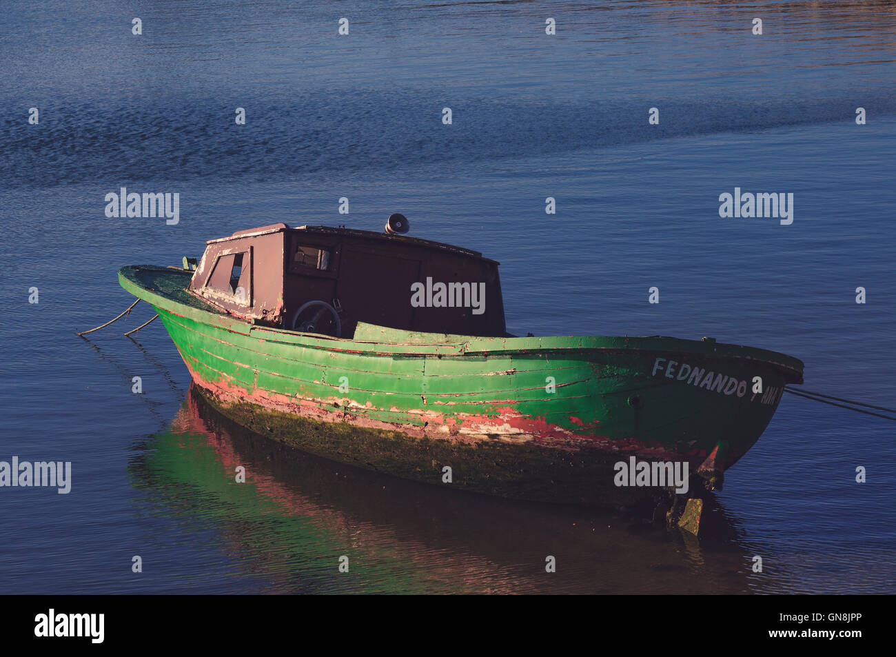 Small fishing boat in the marsh Santoña Victoria and Joyel in Cantabria ...
