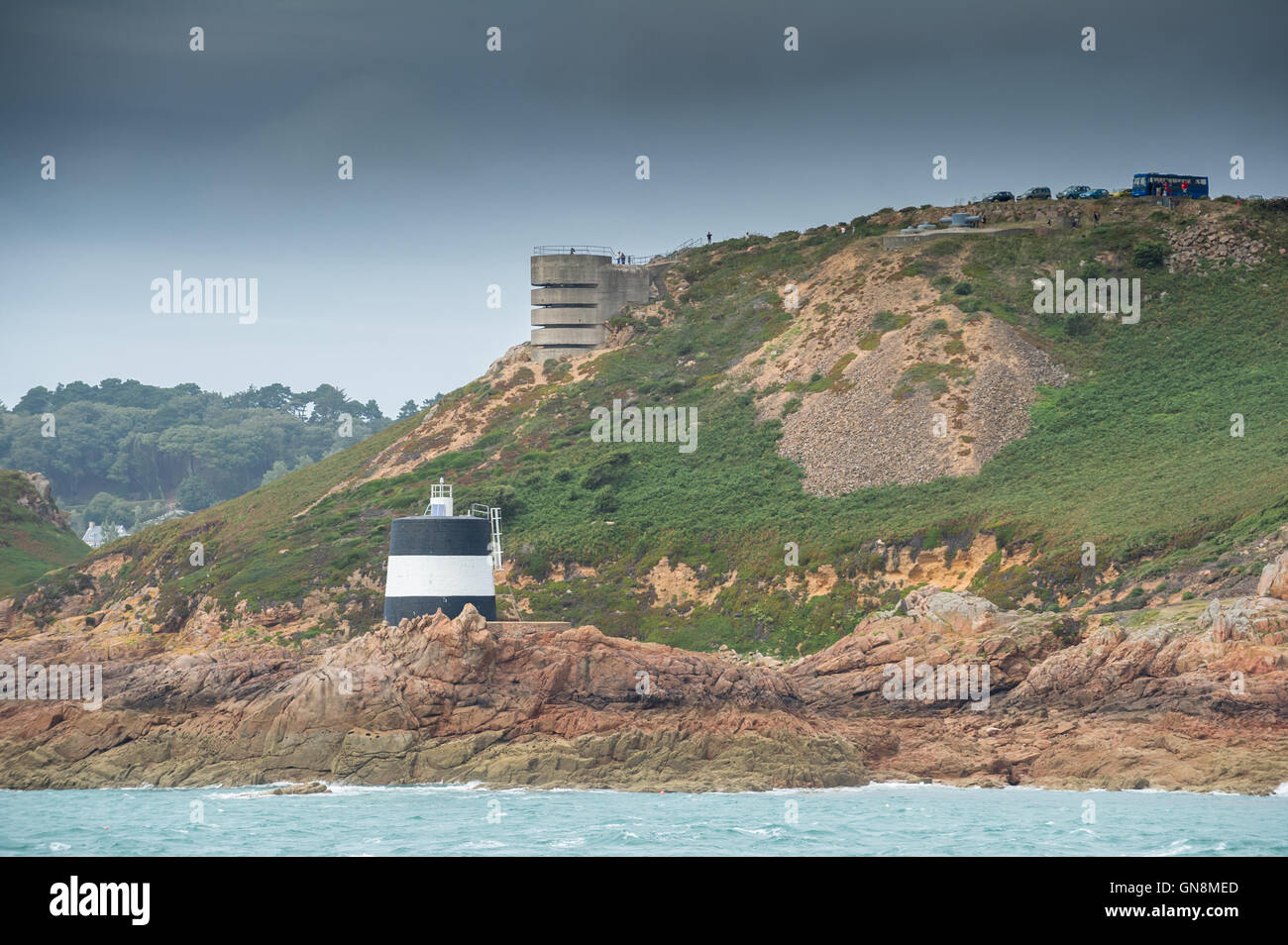Round lighthouse and second world war German observation tower and ...