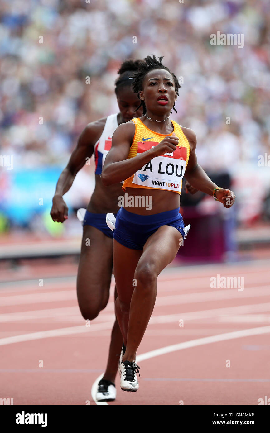 Marie-Josee TA LOU crossing the finish line in the Women's 100m Heat 2 ...