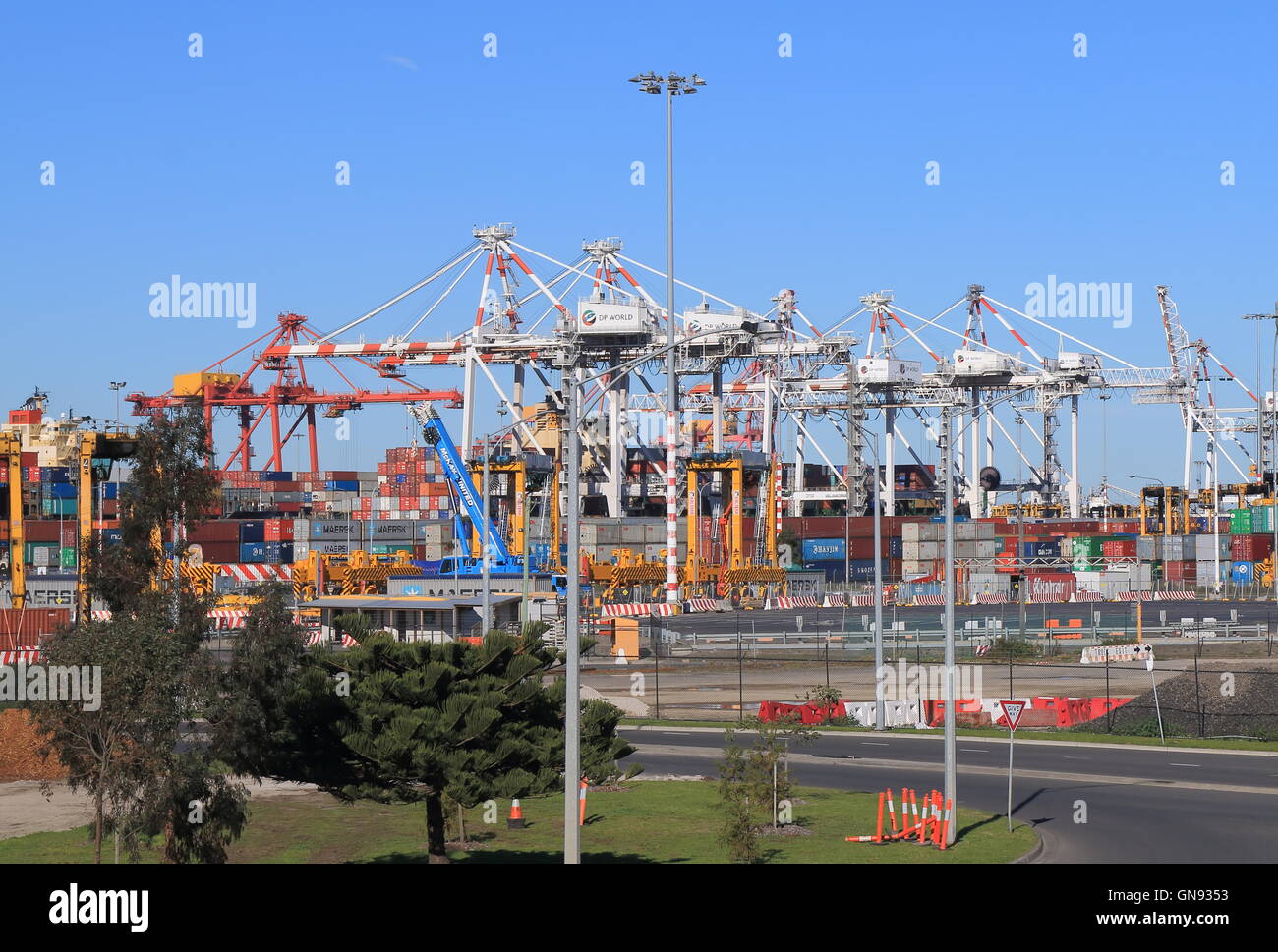 Cargo ships load and unload containers in Port of Melbourne Stock Photo ...