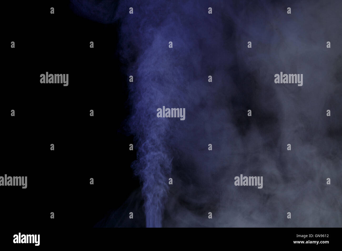 Abstract blue water vapor on a black background. Texture. Design ...