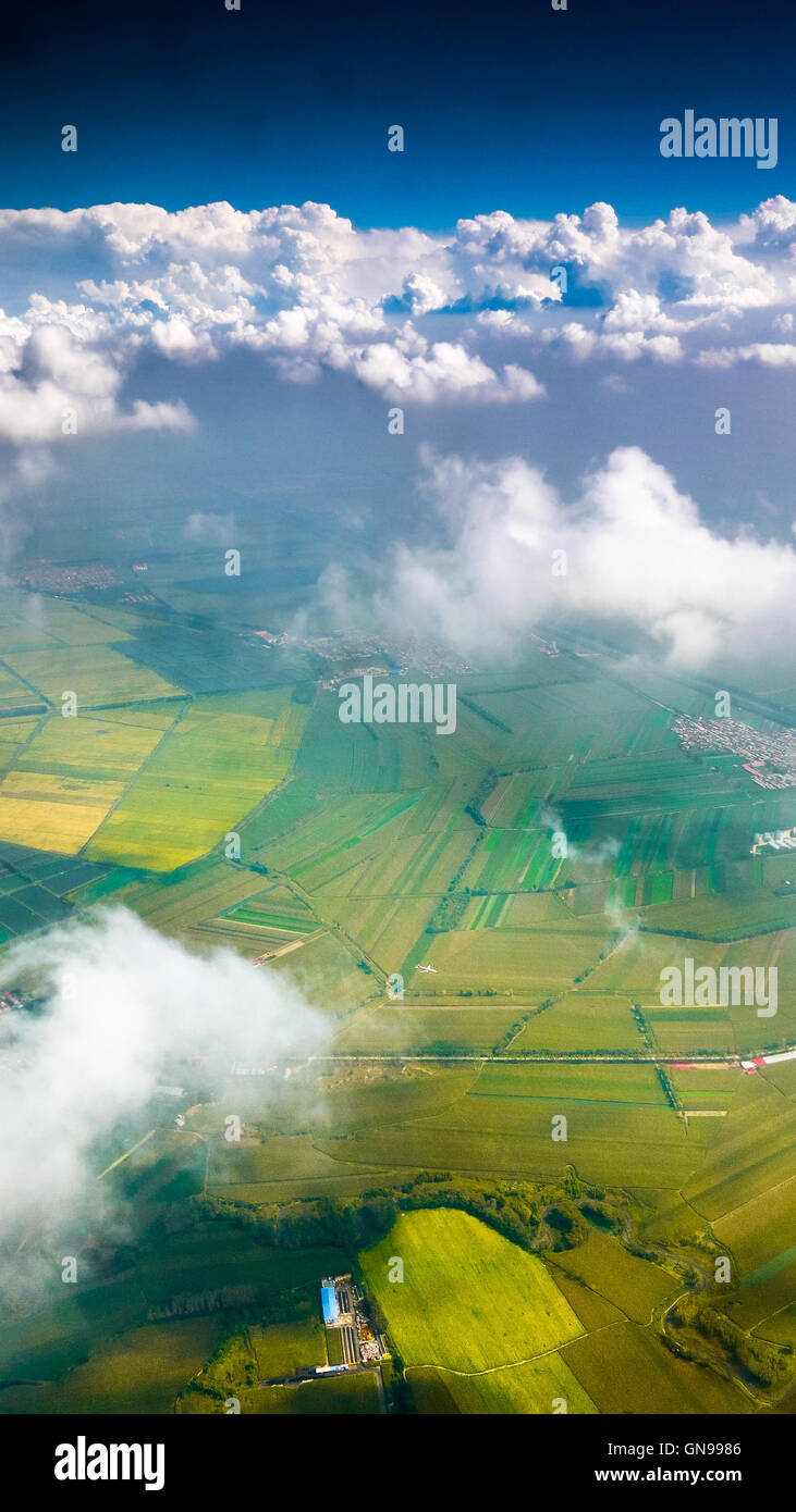 Small airplane under clouds hi-res stock photography and images - Alamy