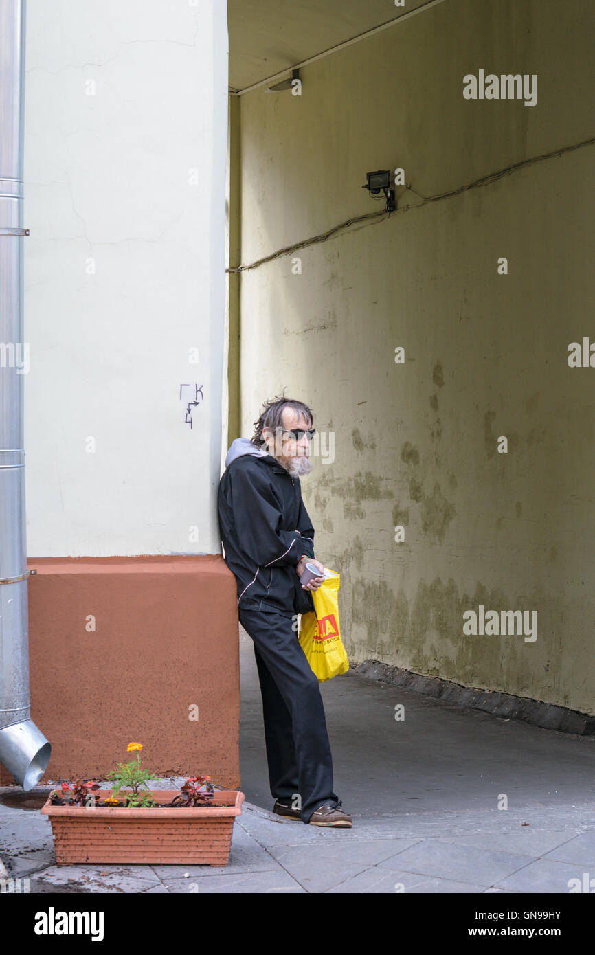Beggar standing hi-res stock photography and images - Alamy