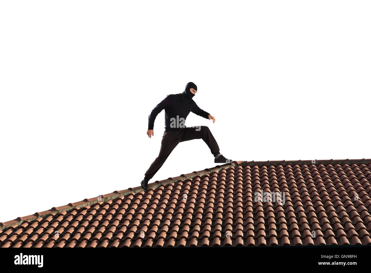 Thief on the roof Stock Photo - Alamy