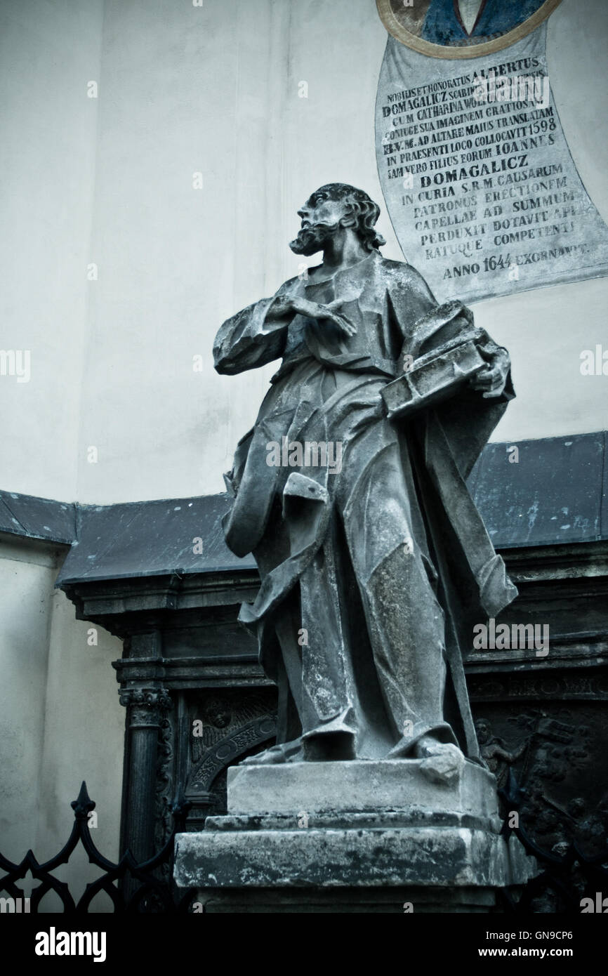 statue with book near Latin Cathedral Stock Photo - Alamy