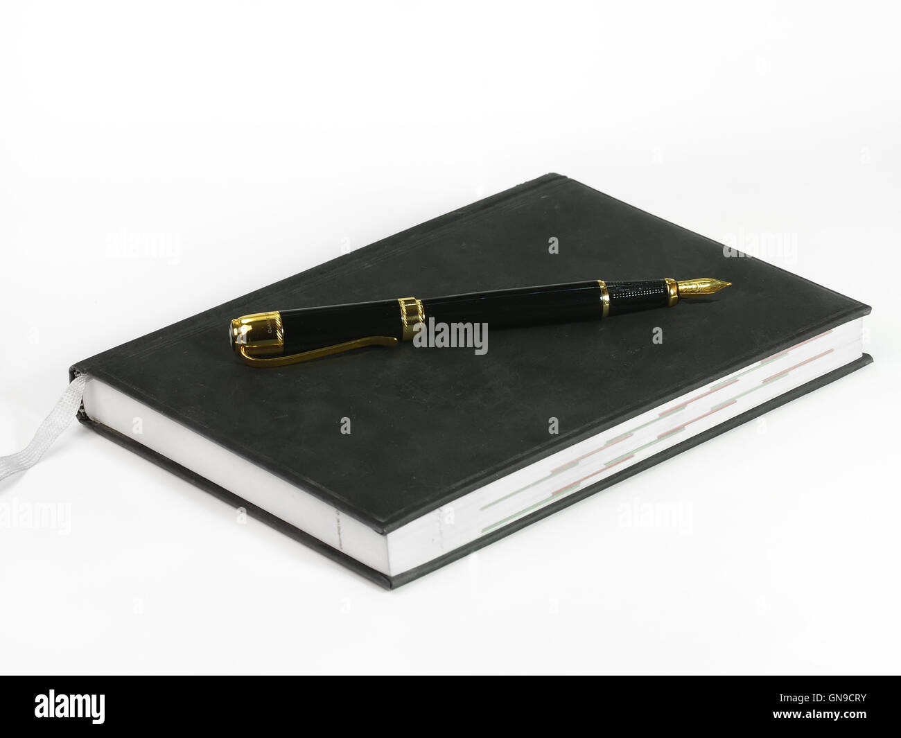 Notebook and pen Stock Photo - Alamy