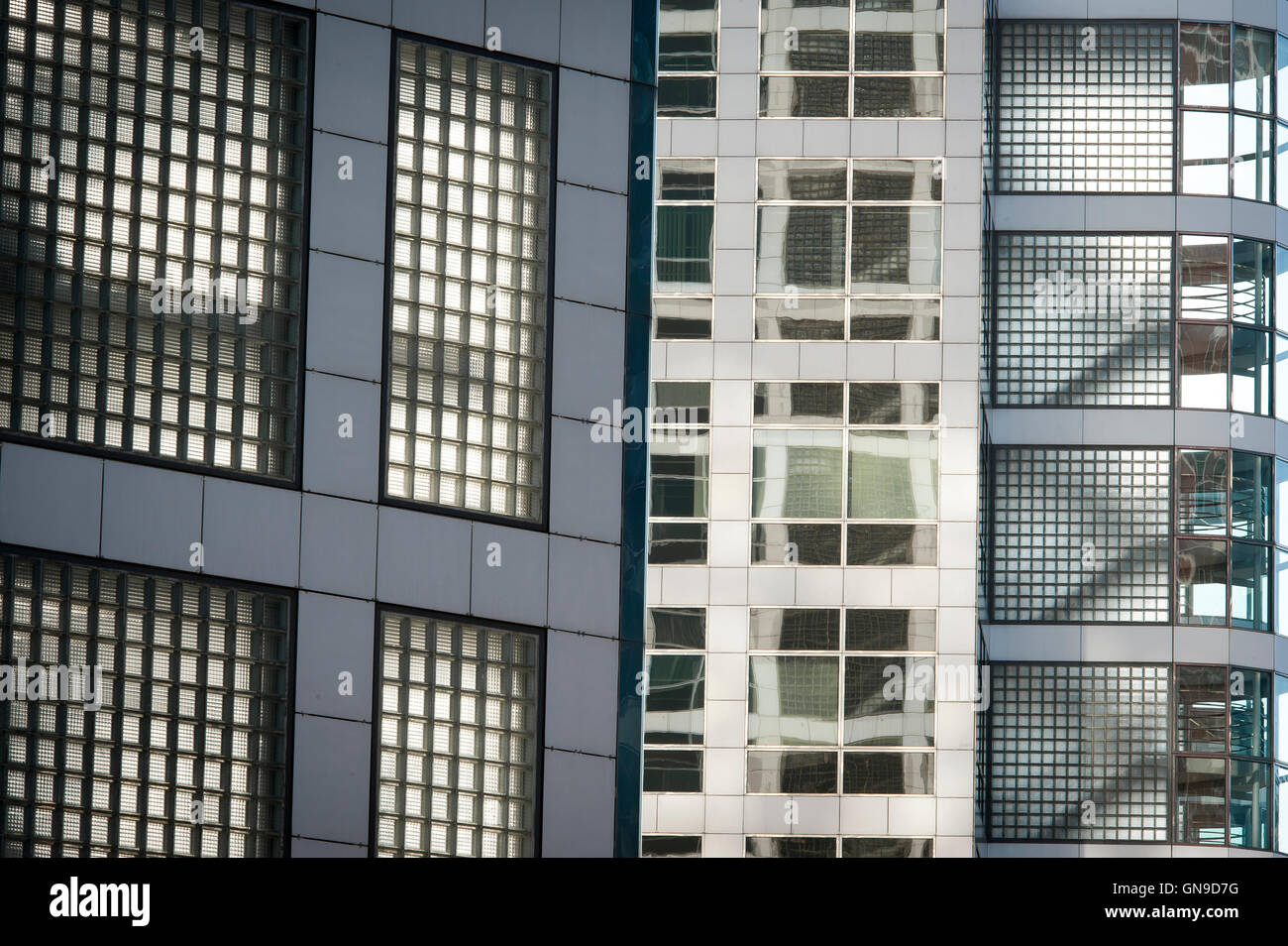 Glass wall with windows Stock Photo - Alamy