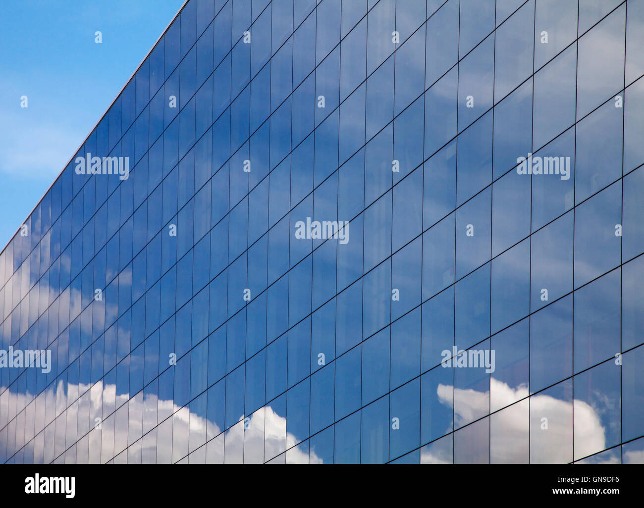 Modern building and blue sky reflection Stock Photo - Alamy