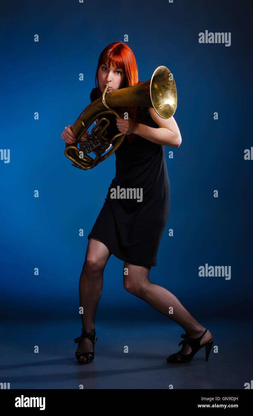 Woman playing trumpet hi-res stock photography and images - Alamy