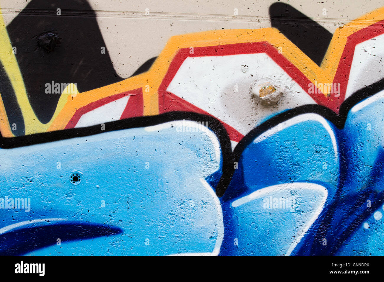 Blue urban grafitti art on the wall of a building Barcelona, Spa Stock ...