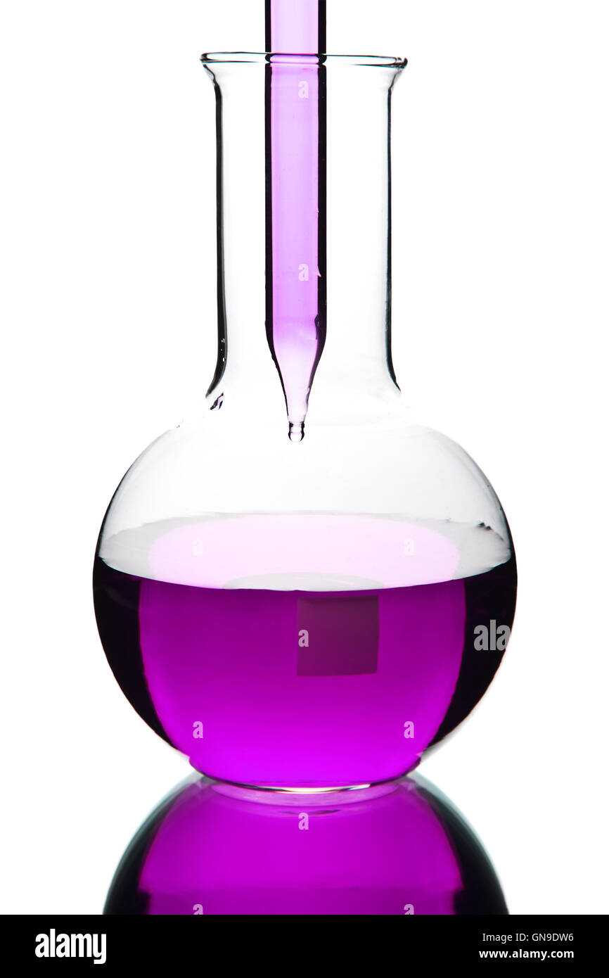 liquid dripping from pipette into flask isolated Stock Photo - Alamy