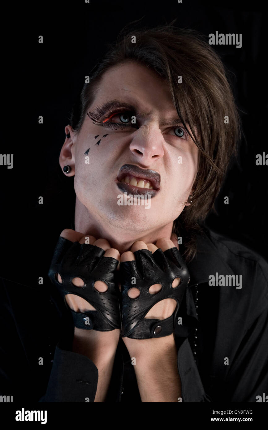 Expressive gothic boy with artistic make-up Stock Photo - Alamy