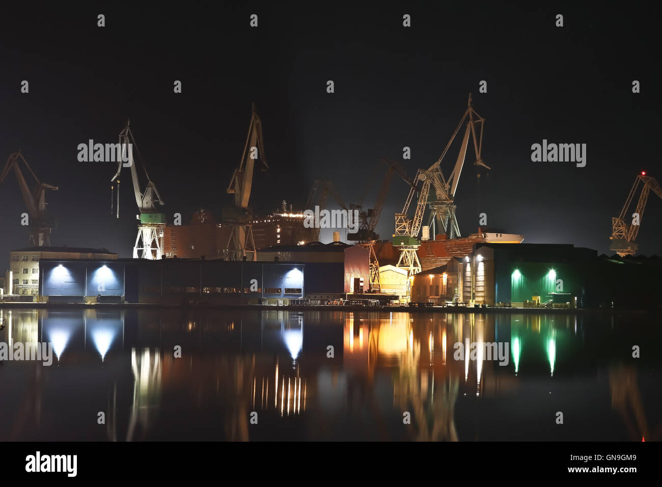 shipyard by night Stock Photo - Alamy