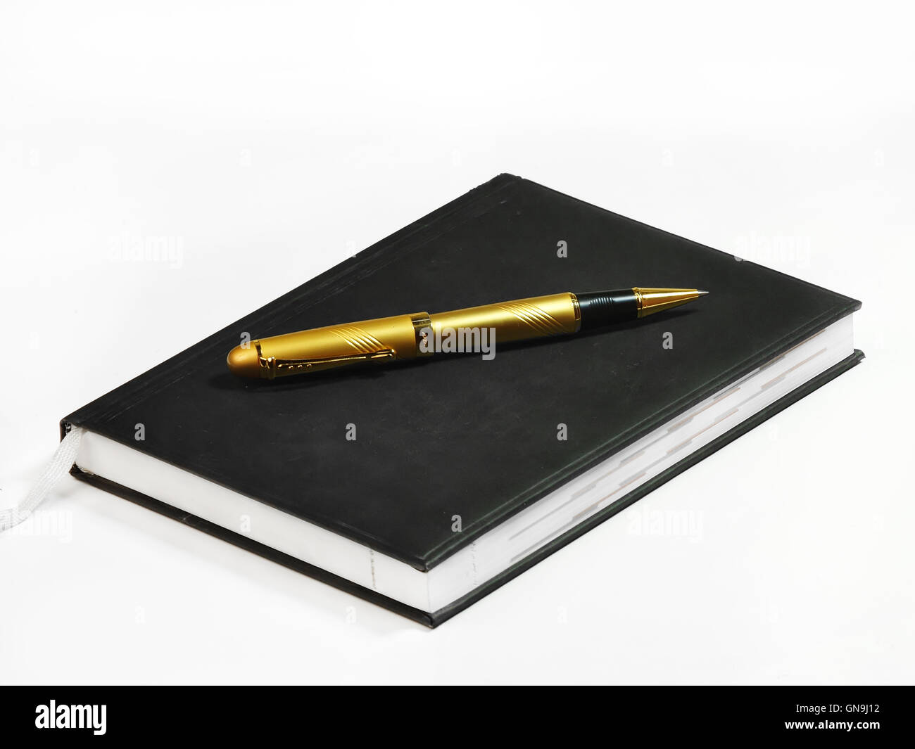 Notebook and pen Stock Photo - Alamy