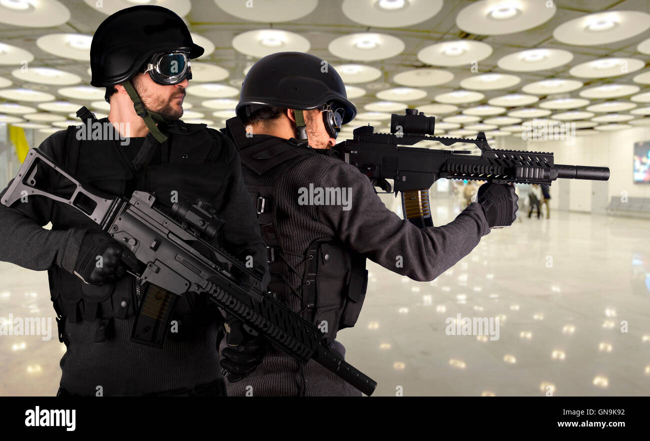 Defense against terrorism, two soldiers at an airport Stock Photo - Alamy
