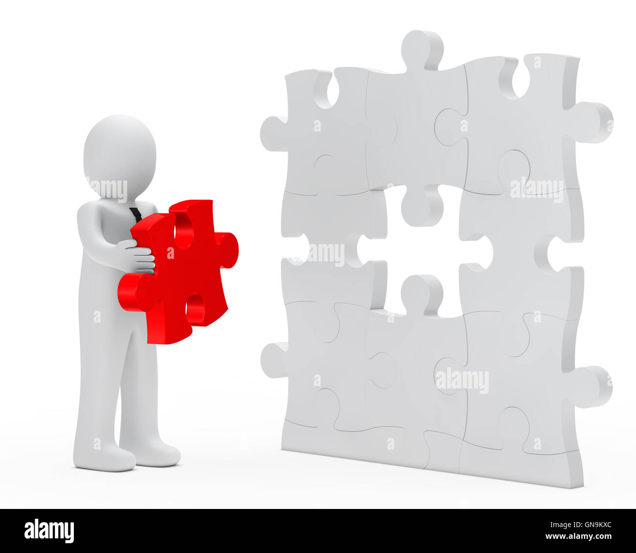 Man solving jigsaw puzzle Cut Out Stock Images & Pictures - Alamy