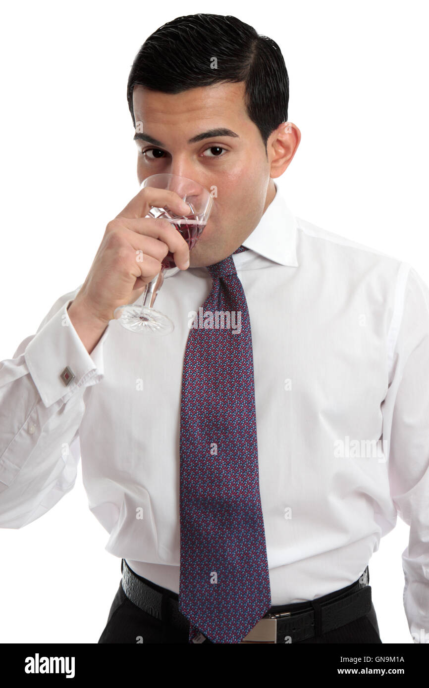 Man tasting drinking sparkling wine Stock Photo - Alamy