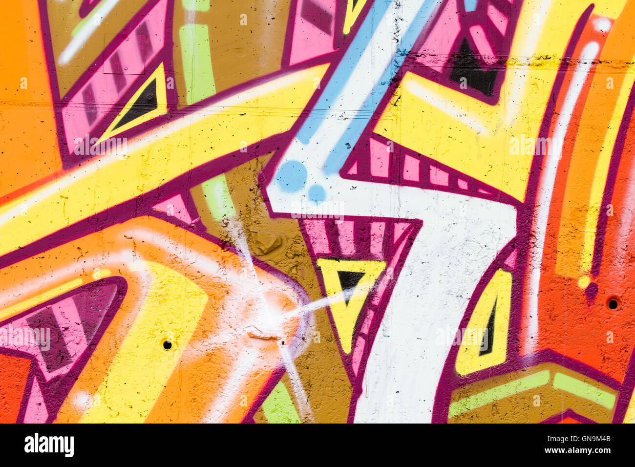 Colorful segment of a graffiti, spanish urban art Stock Photo - Alamy