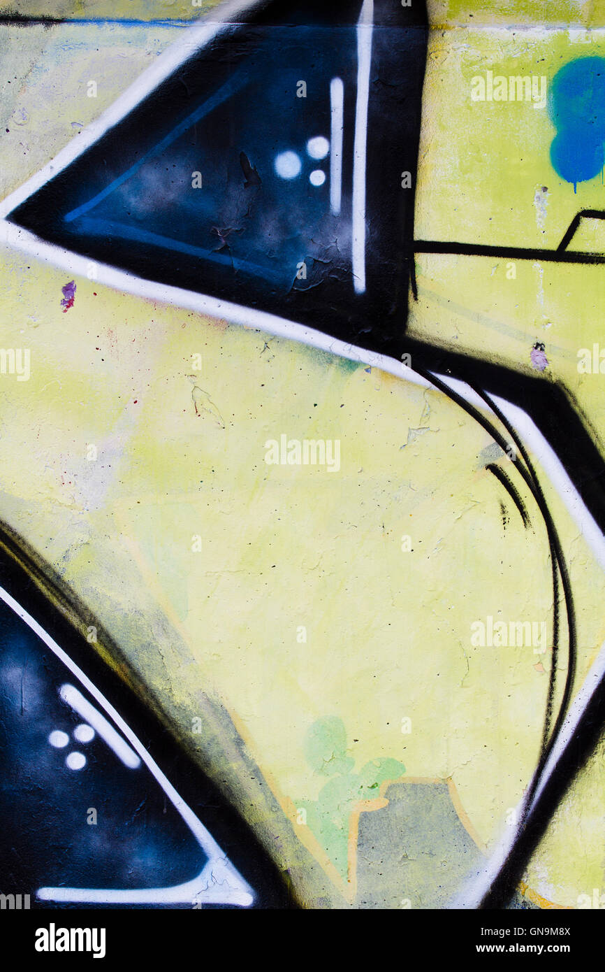 Rusty textured Wall painted with bright colorful graffiti Stock Photo ...