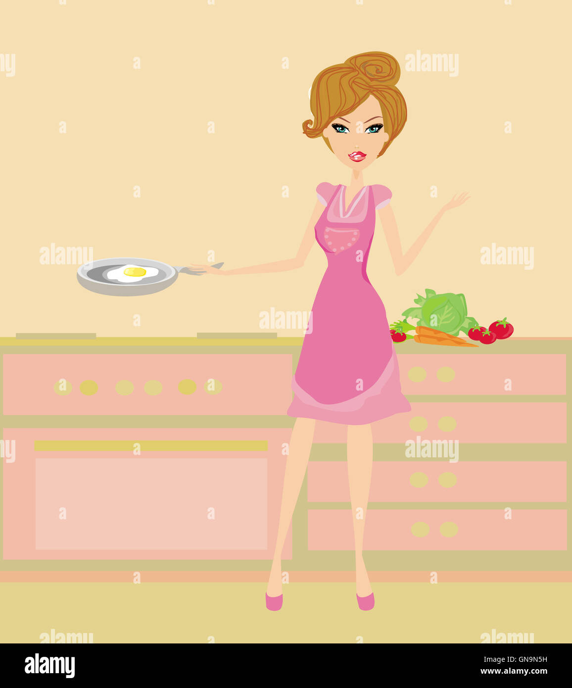 Beautiful lady cooking Stock Photo - Alamy