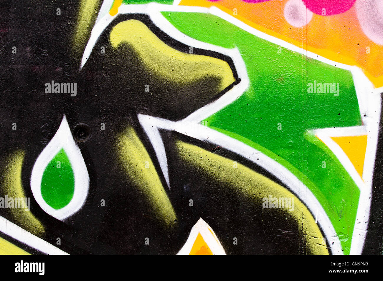 Green graffiti on a wall Stock Photo - Alamy