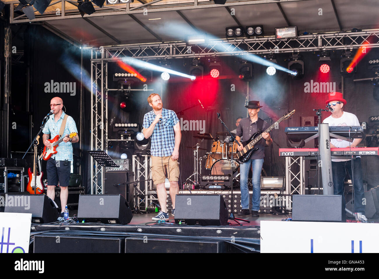 Rock band Paragraph 1, performing onstage. Five man group, two guitar ...