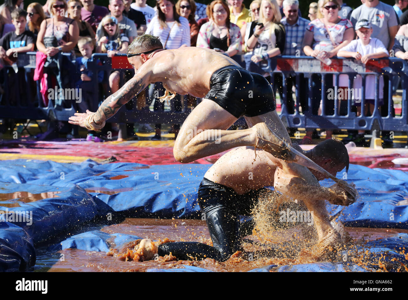 A wrestling competitor jumps over his opponent, Stacksteads,29th August ...
