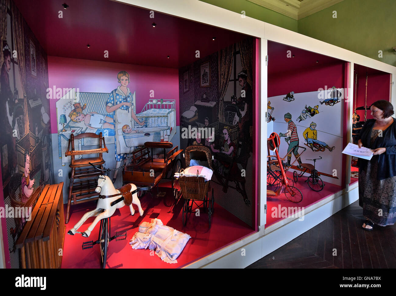 The director of the German Pram Museum, Kristin Otto, walks through the ...