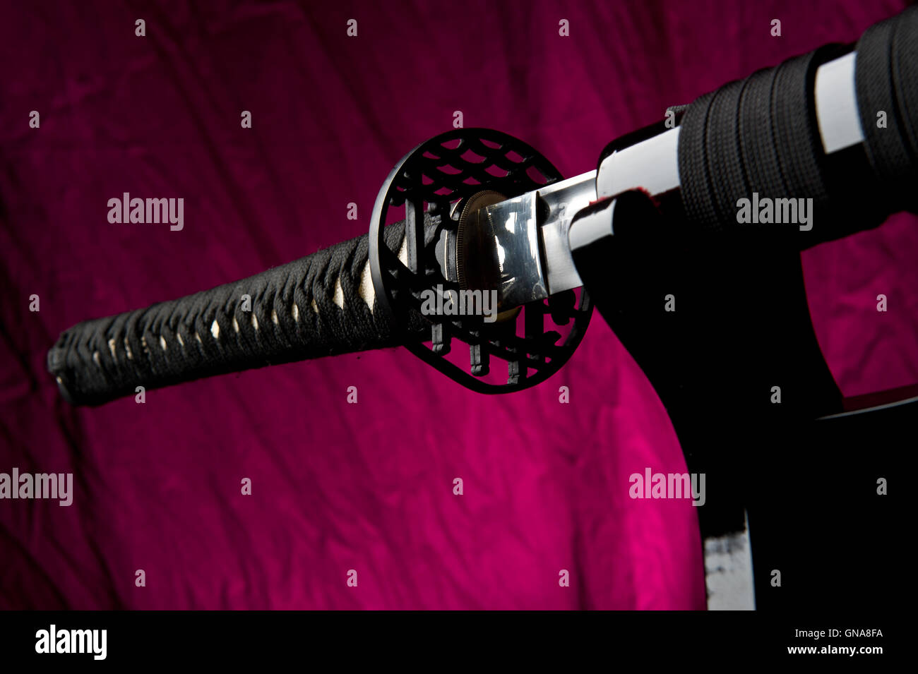 Japanese Katana on stand - close up Stock Photo - Alamy