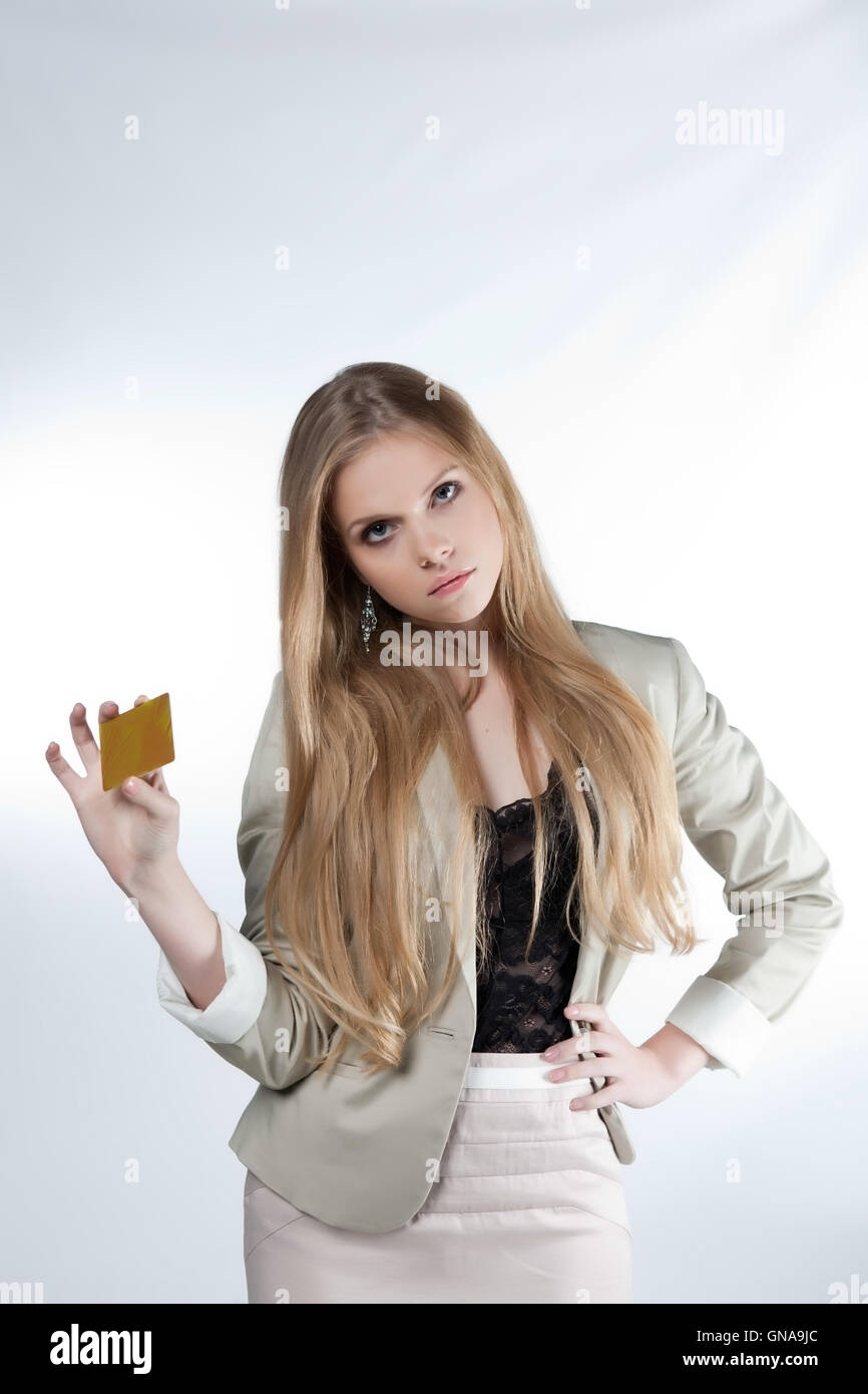 beautiful girl show golden credit card Stock Photo - Alamy