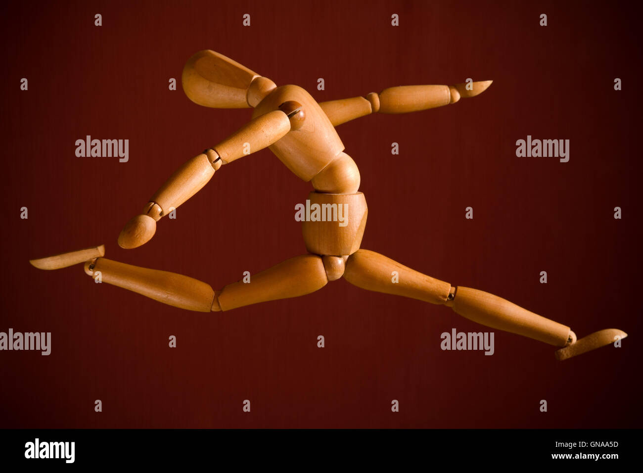 Flying wooden puppet Stock Photo - Alamy