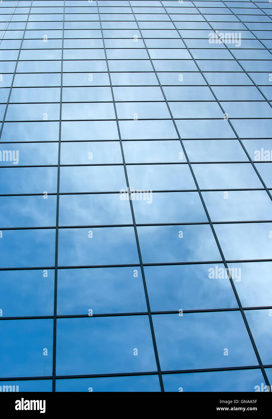 Modern office building with blue square windows Stock Photo - Alamy