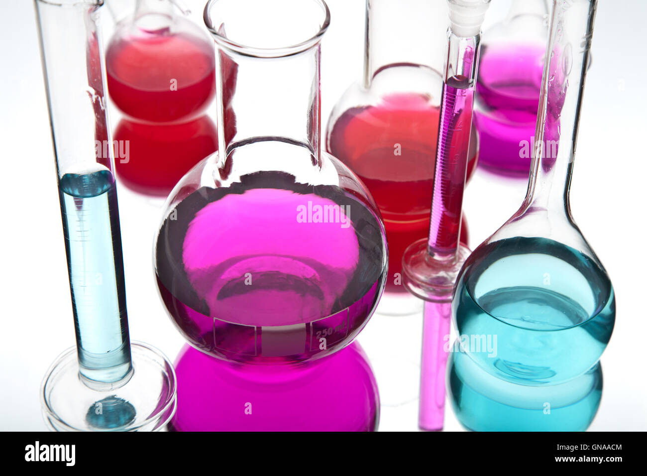 laboratory glassware with colorful chemicals Stock Photo - Alamy