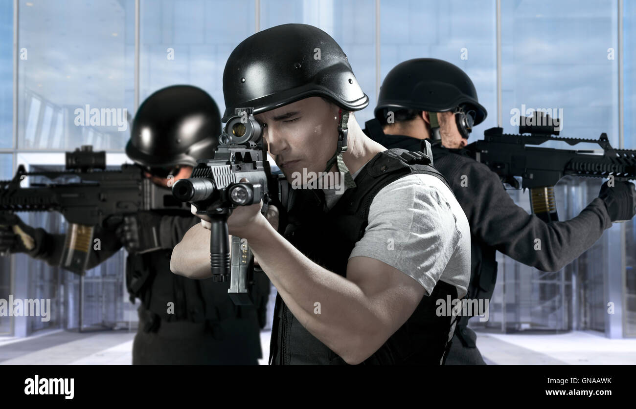 Police against terrorism, two soldiers at a business building Stock ...