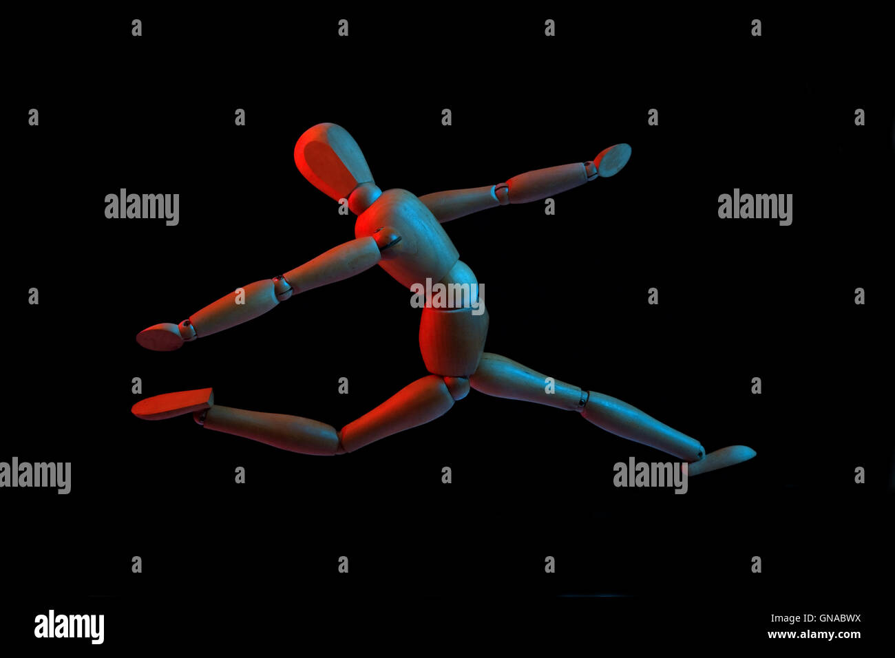 Flying wooden puppet Stock Photo - Alamy