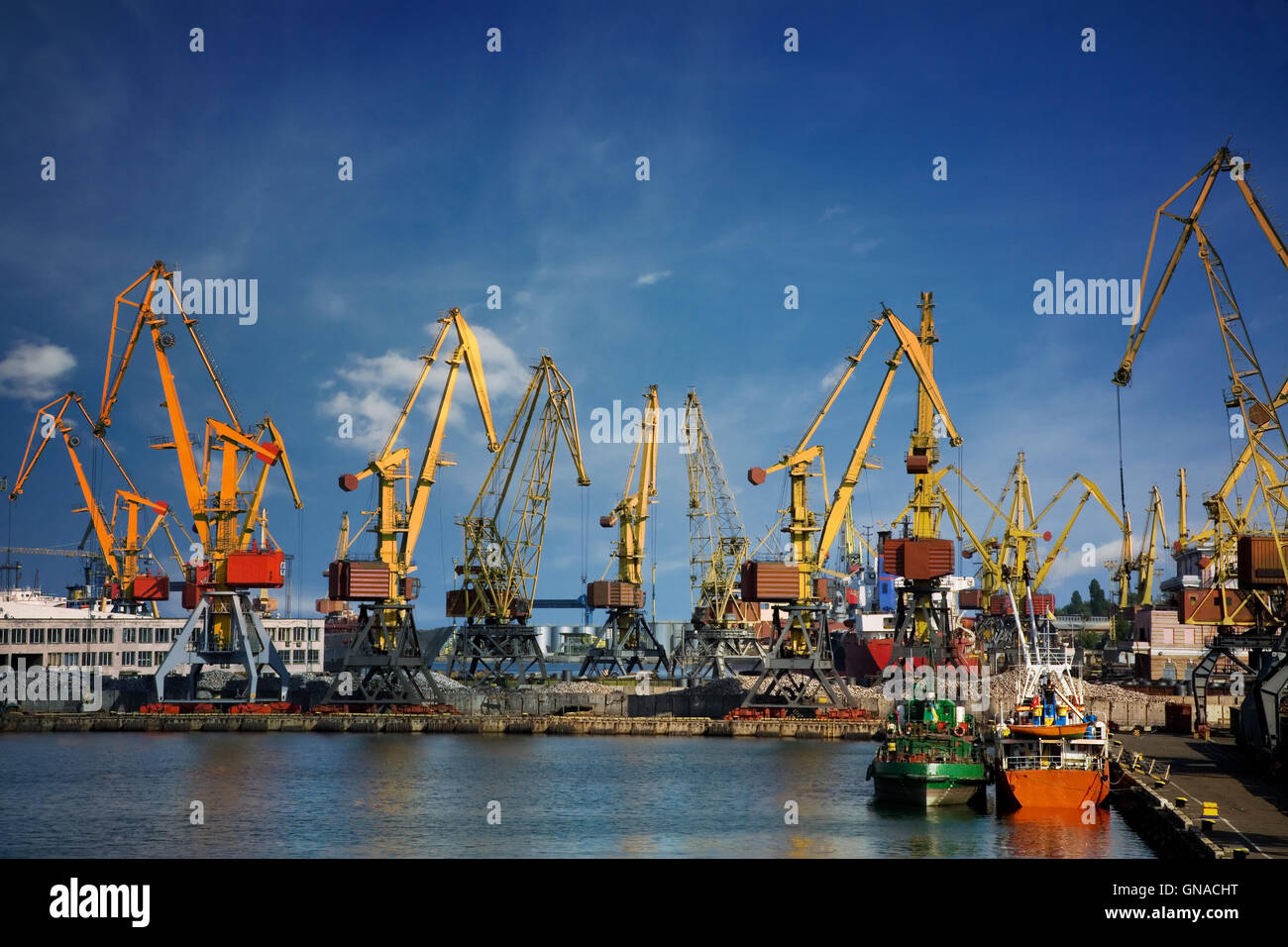Wharf cranes working port hi-res stock photography and images - Alamy