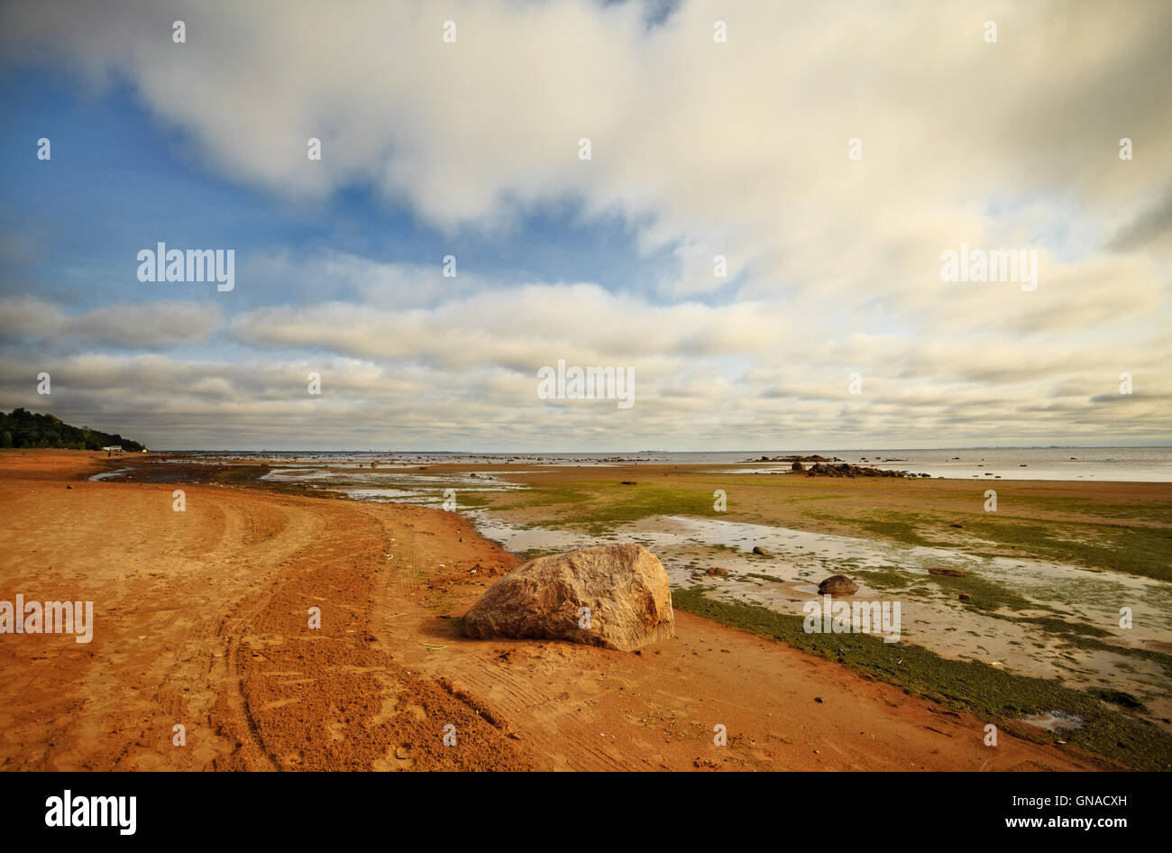 seashore with big stone Stock Photo - Alamy