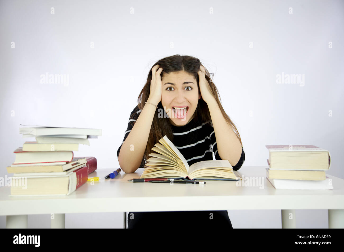 Female model studying shouting Stock Photo - Alamy