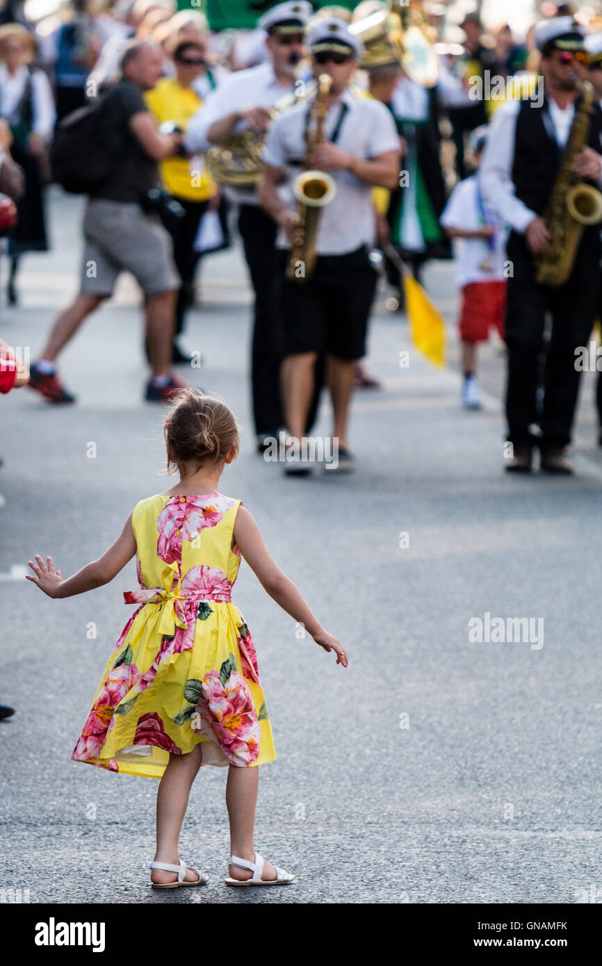 Little girl, 5-6 years old, from audience, stepping out in front of ...